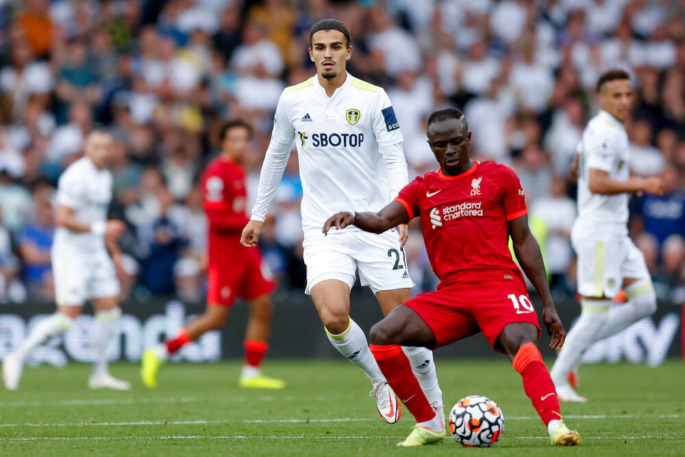 ‘Out of control’- Liverpool fans react to ‘dangerous’ Struijk challenge ...